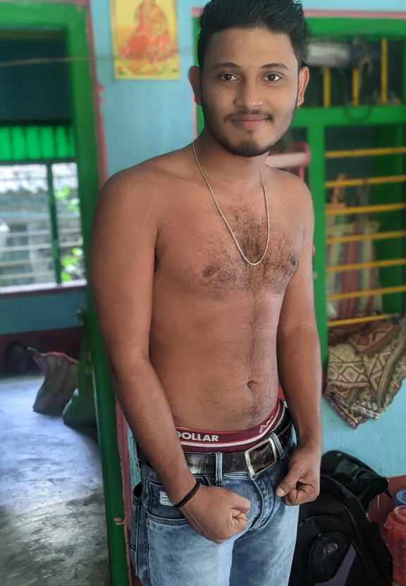 a man without a shirt standing... | Image by SnowEnough