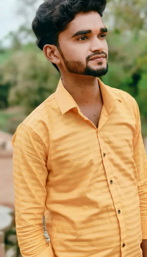 a man in a yellow shirt standing... | Image by LovelyWriter