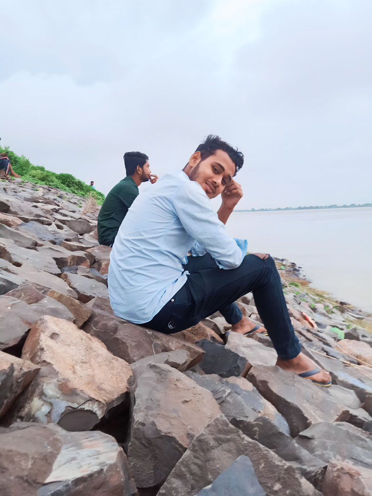 a man sitting on rocks talking... | Video by BetterLulo
